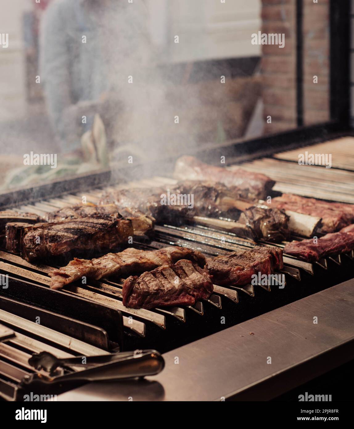 Some excellent pieces of Argentinian beef on a charcoal grill Stock ...