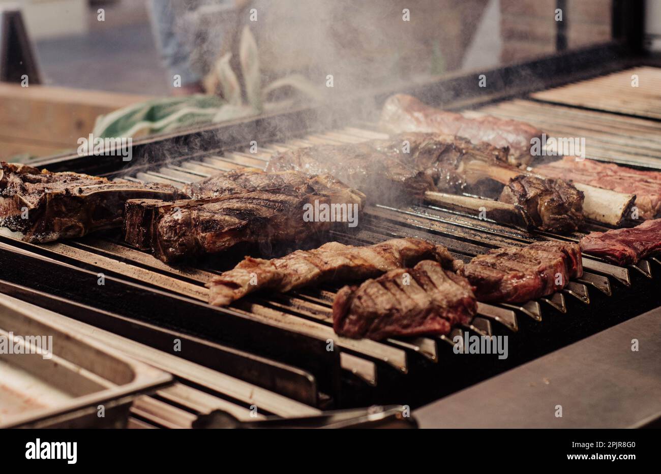 Some excellent pieces of Argentinian beef on a charcoal grill Stock ...