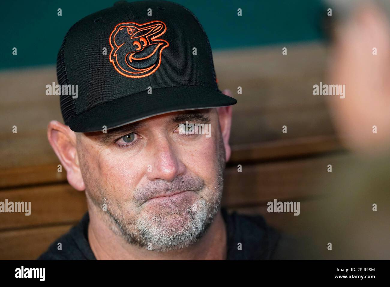 Baltimore Orioles manager Brandon Hyde listens to a question in the ...