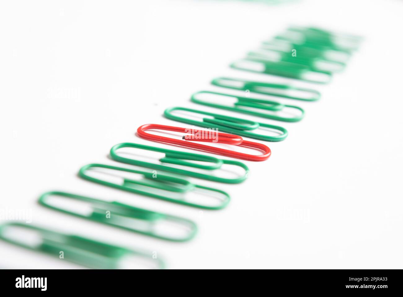 Paperclip isolated on white background, unique and individuality ...