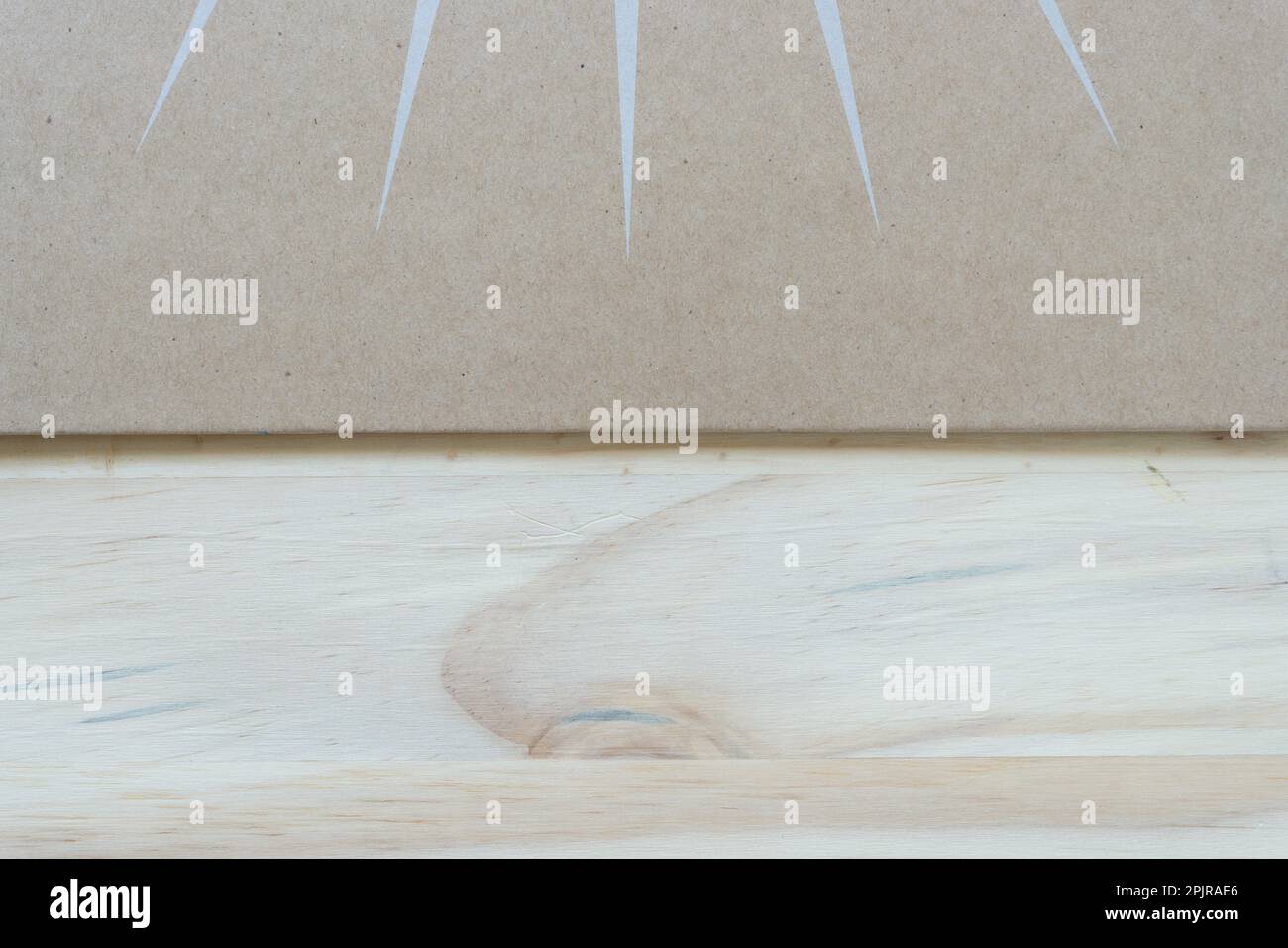 plain cardboard folder with decorative pattern on wood Stock Photo - Alamy