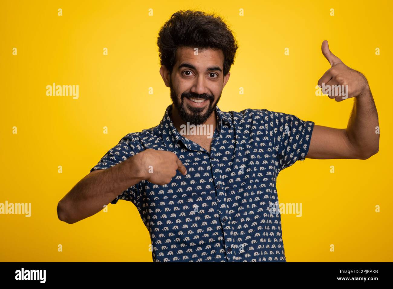 I am the best, choose me. Young excited indian man winner feeling very ...
