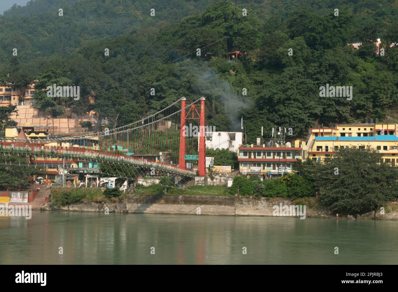 Ram jhula bridge view ganga river and green mountains Stock Photo - Alamy