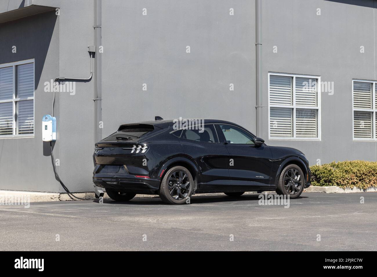 Plainfield - Circa April 2023: Ford Mach-E Mustang SUV display. The ...