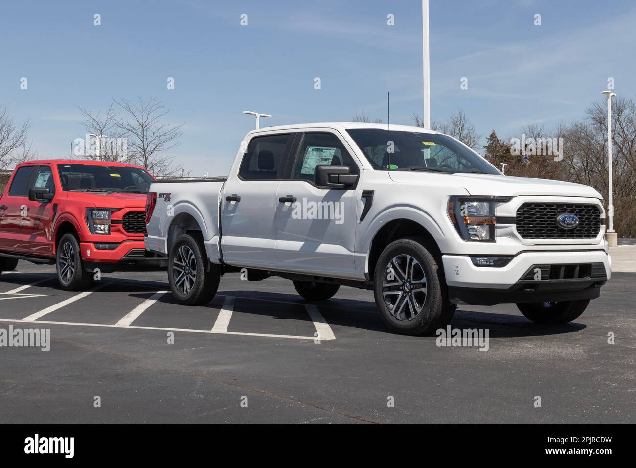 Plainfield - Circa April 2023: Ford F-150 display at a dealership. The ...