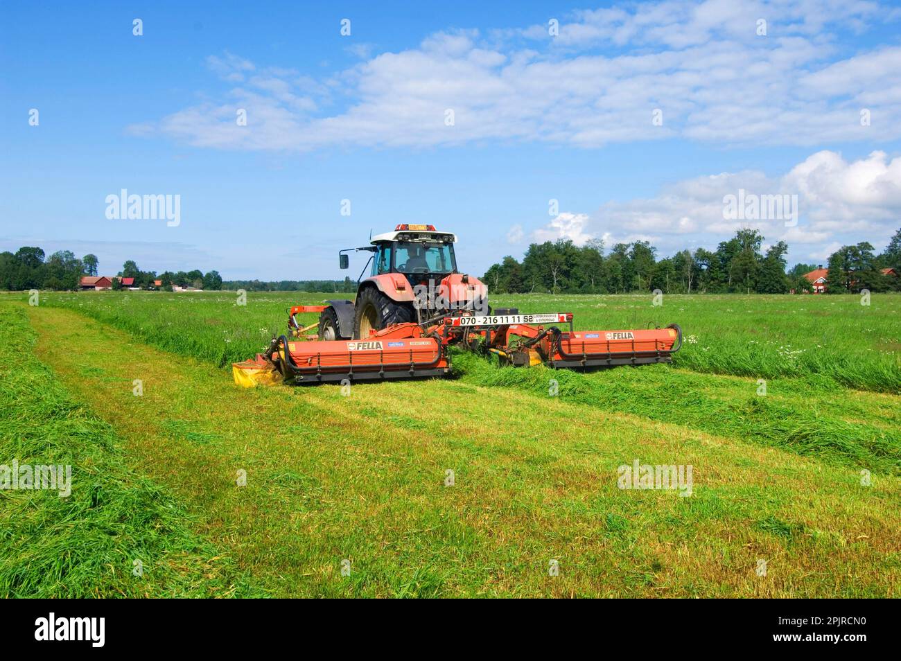 Tractor mowing machine silage machine hi-res stock photography and ...