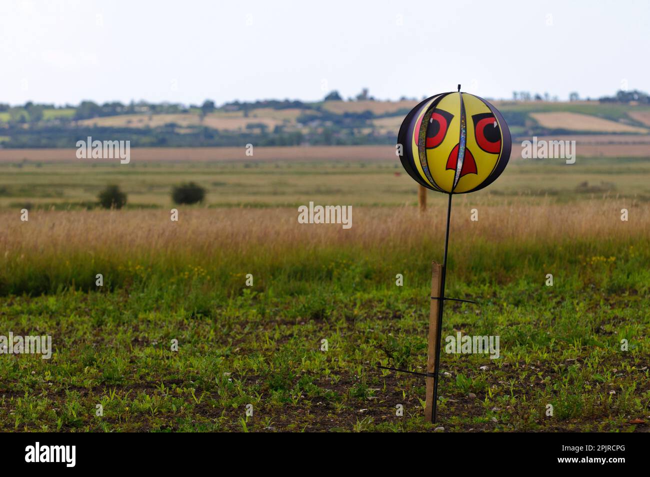 Birdscarer, rotating sphere with reflective plates and raptor face ...