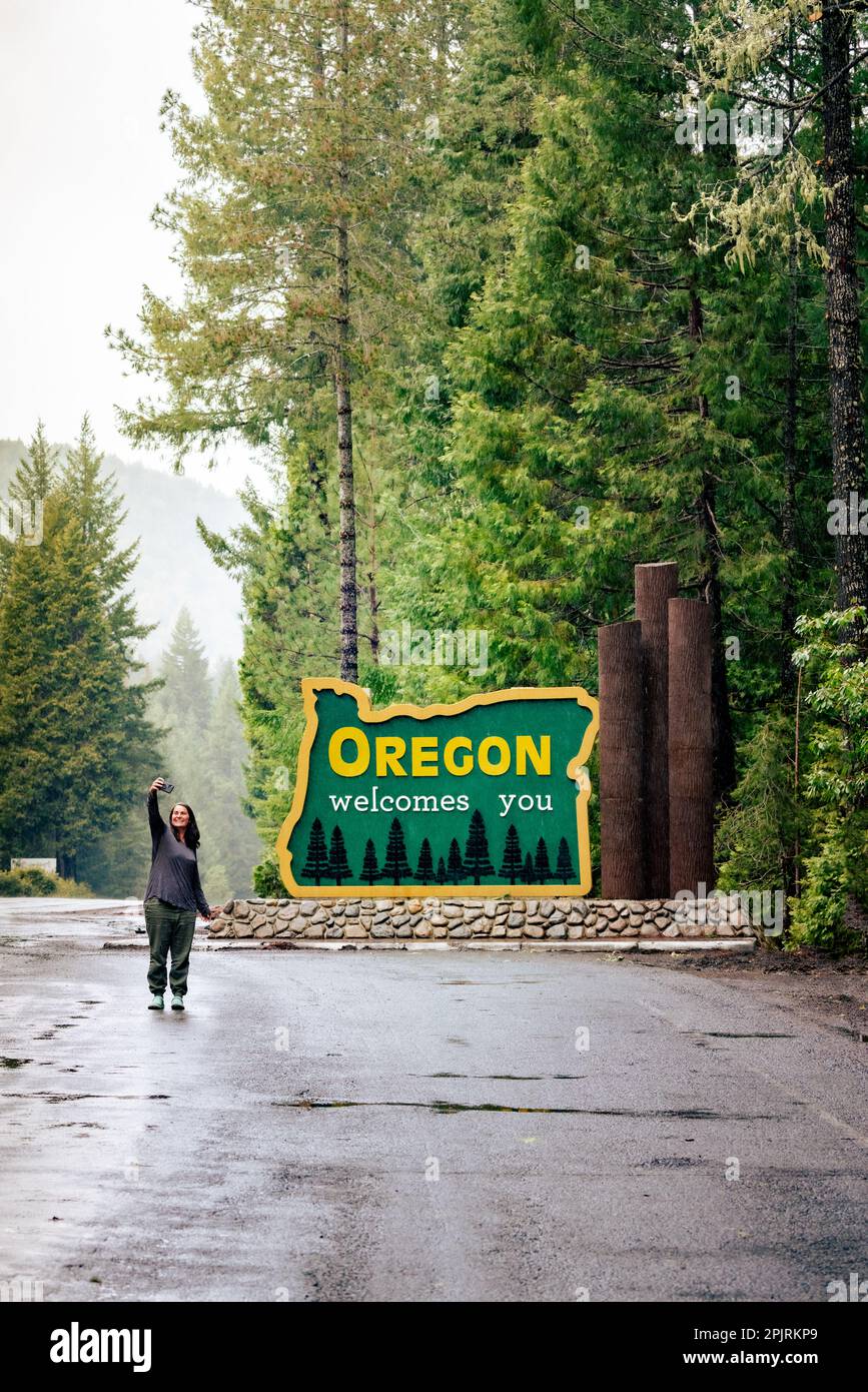 Woman takes selfie on green hi-res stock photography and images - Alamy
