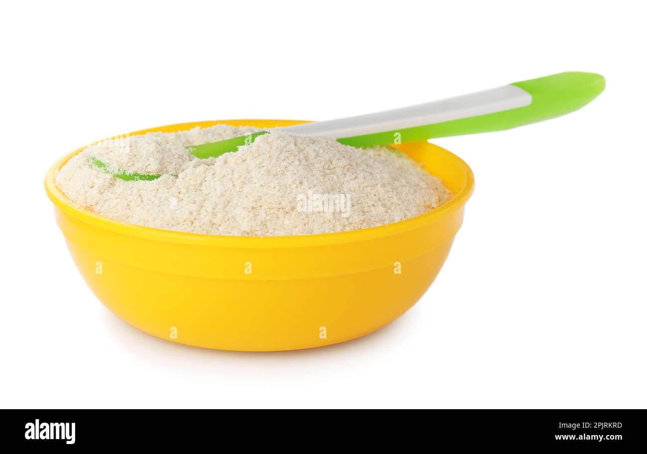 Dry healthy baby food in bowl on white background Stock Photo - Alamy