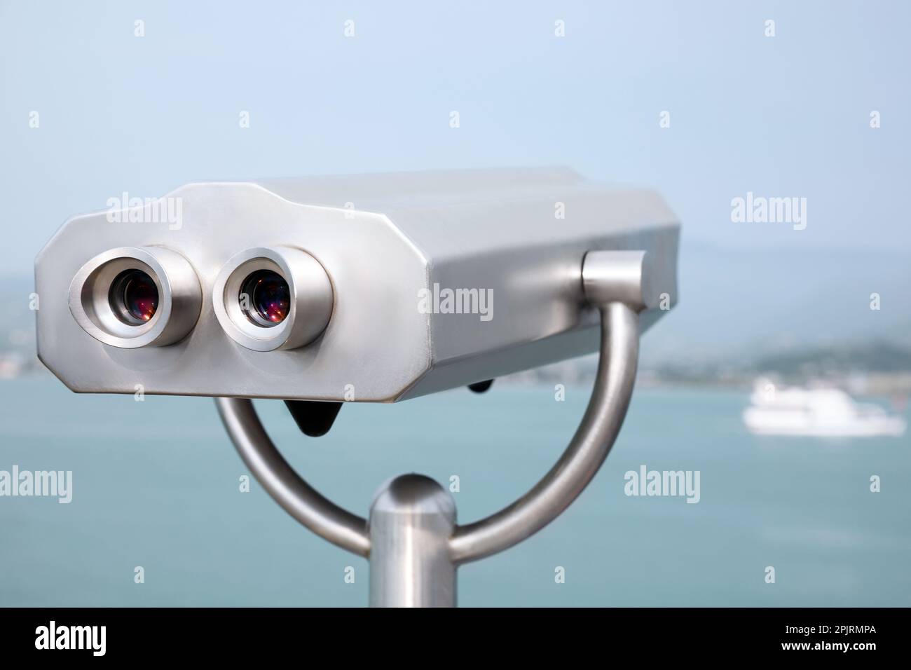 Metal tower viewer installed near sea. Mounted binoculars Stock Photo ...