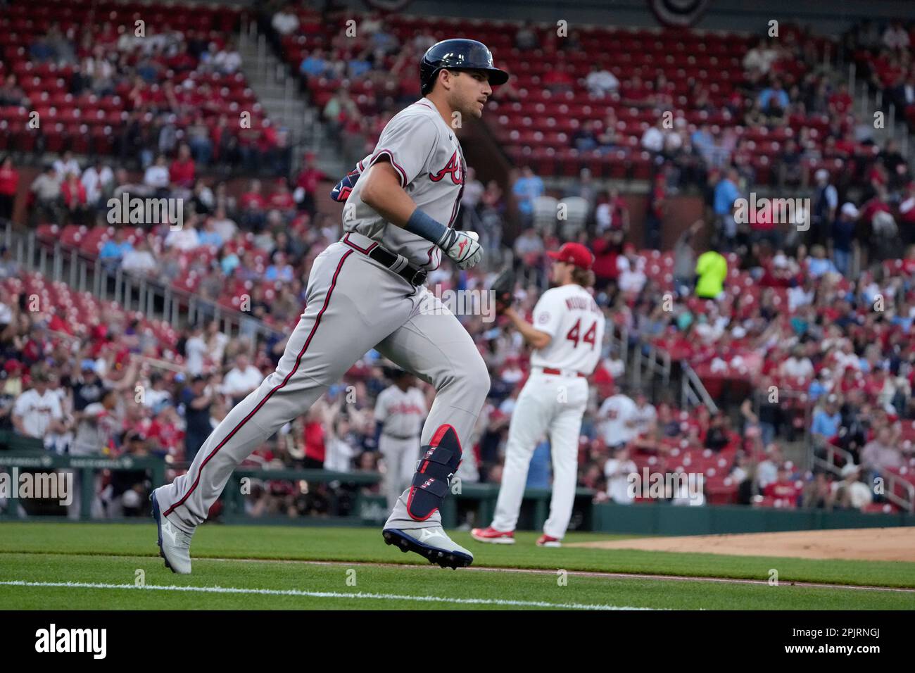 Atlanta Braves' Austin Riley, left, rounds the bases after hitting a ...