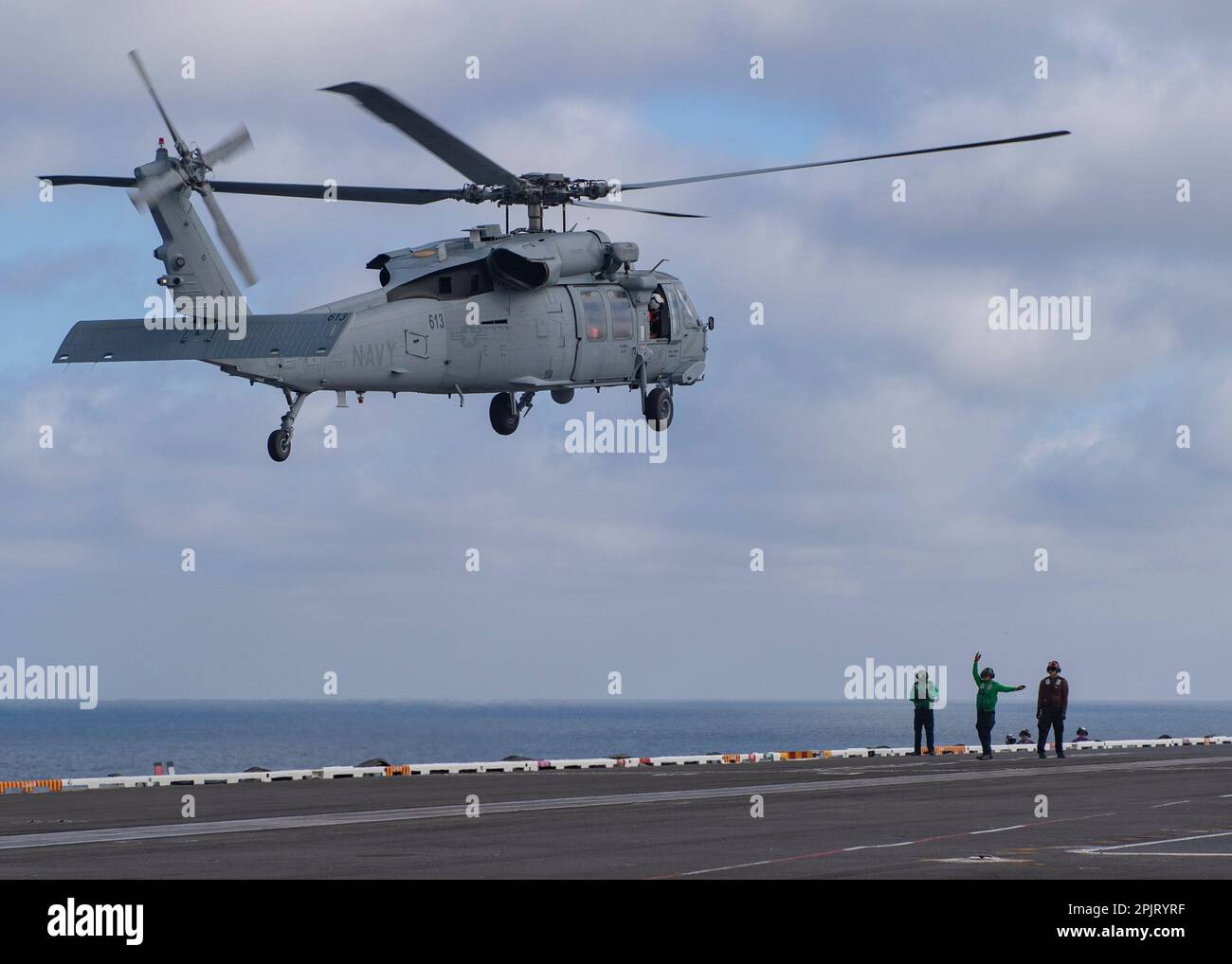 PACIFIC OCEAN (April 2, 2023) – An MH-60S Sea Hawk, assigned to the ...