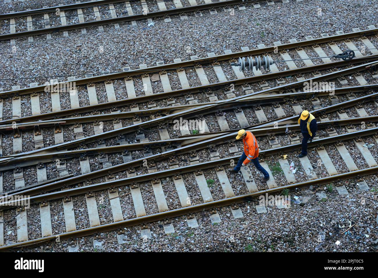 Railway workers in Shanghai, China Stock Photo - Alamy