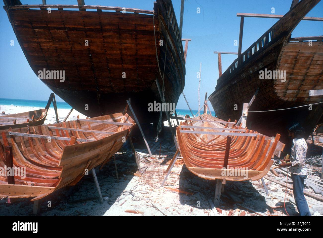 Boat building yard in Ajman with wooden dhows under construction UAE ...