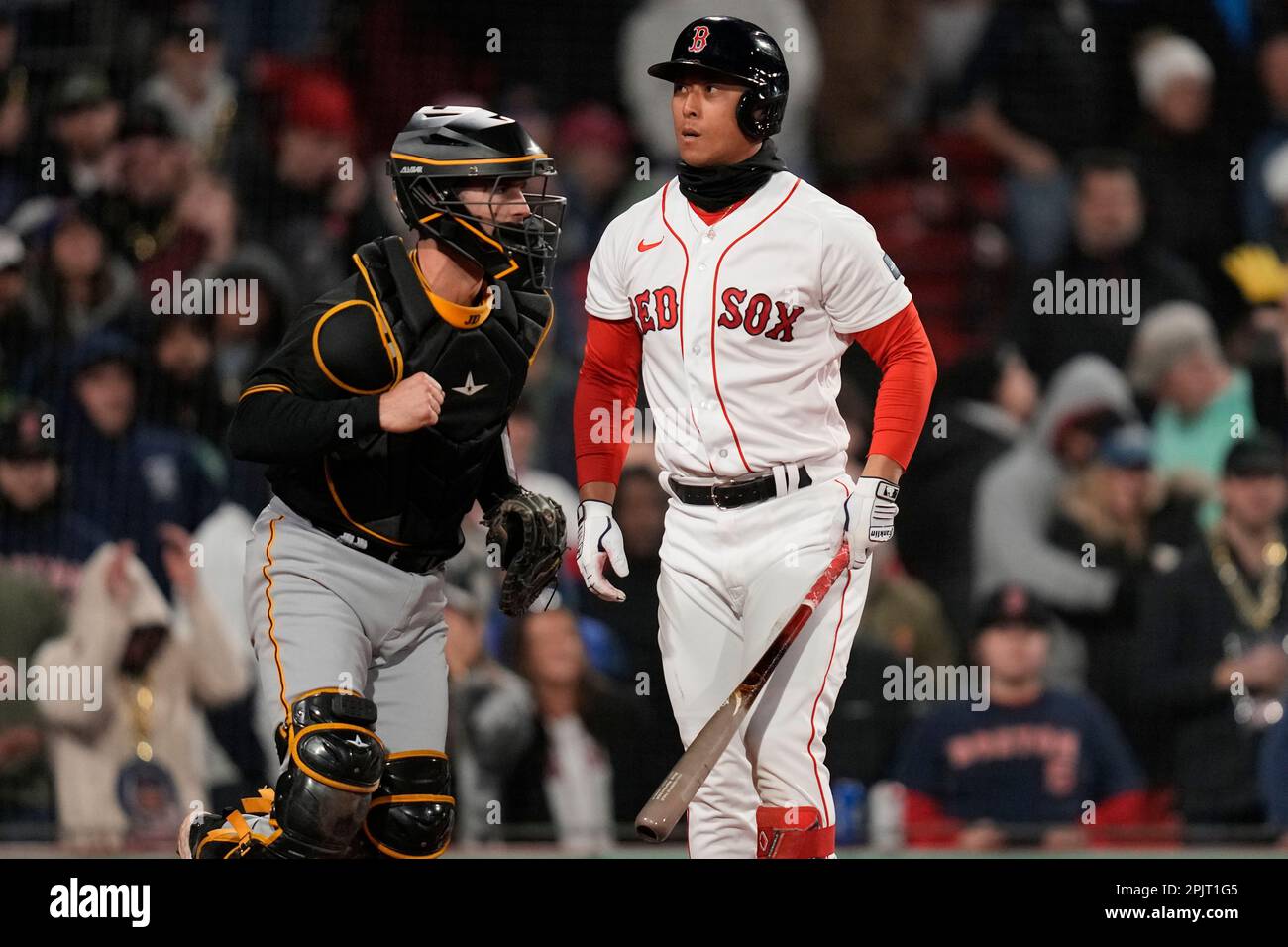 Boston Red Sox's Rob Refsnyder, right, heads back to the dugout after ...