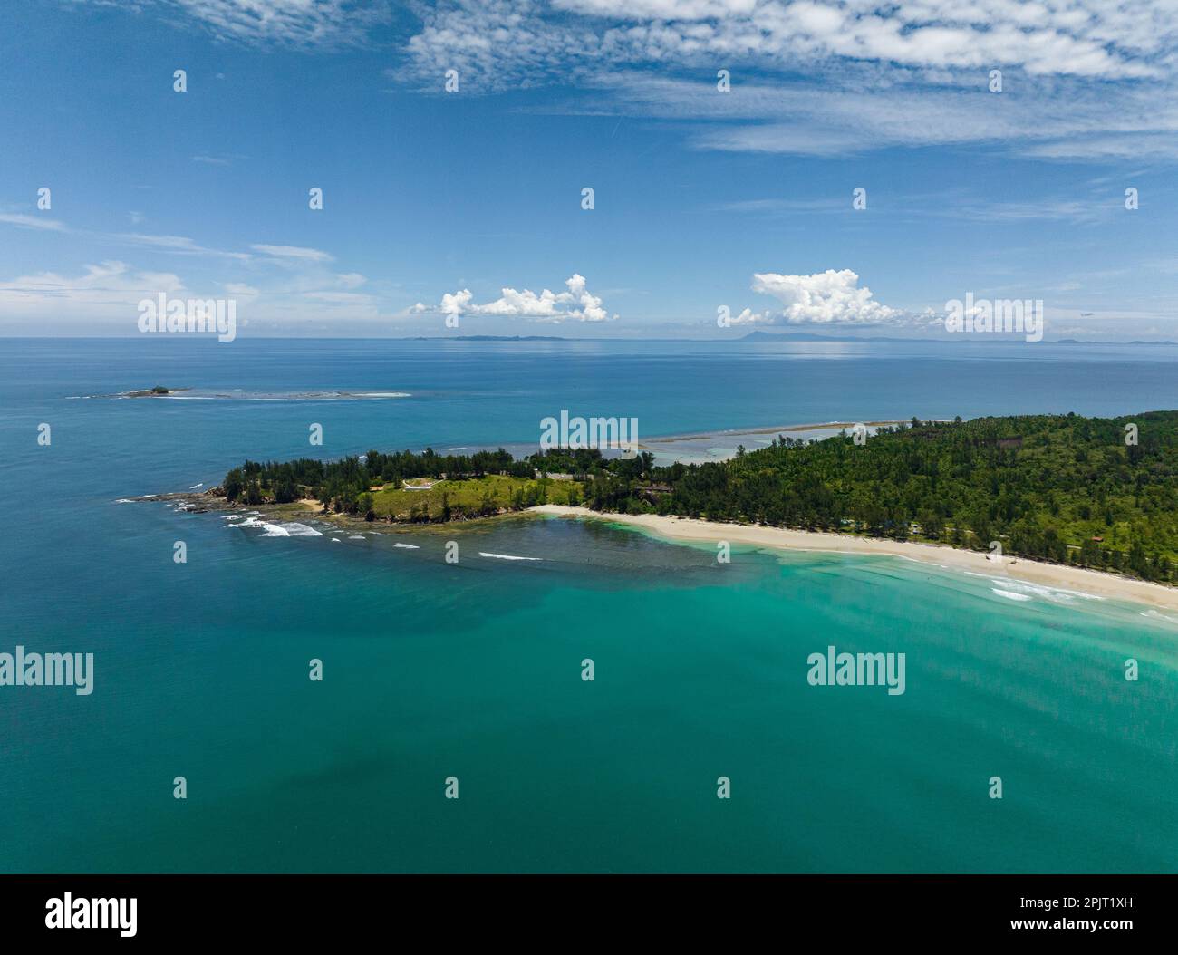 Aerial drone of sandy beach and turquoise water of the tropical sea ...