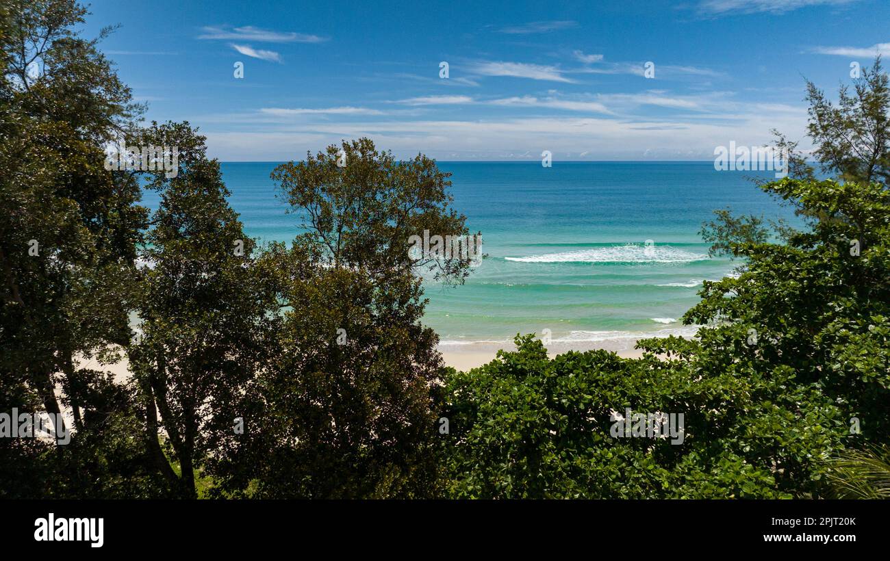 Tropical beach and blue sea through the trees. Sabah, Borneo, Malaysia ...