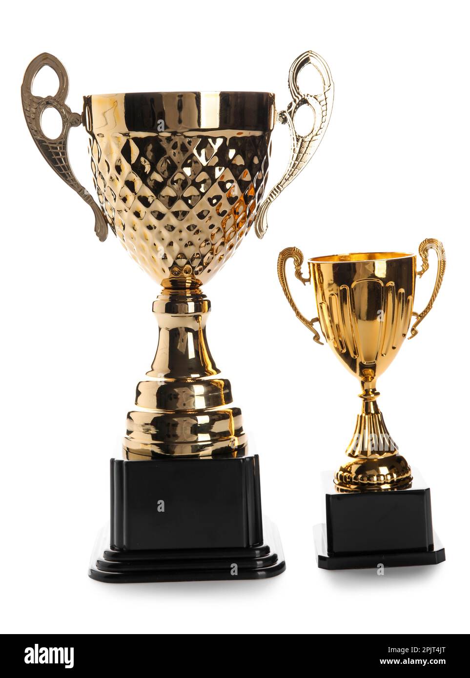 Gold cups on white background Stock Photo - Alamy