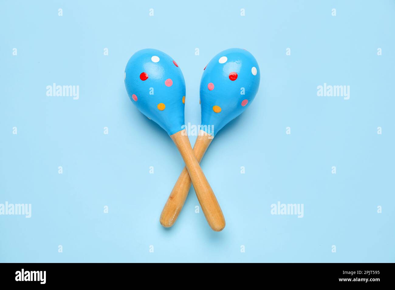Mexican maracas on blue background Stock Photo - Alamy