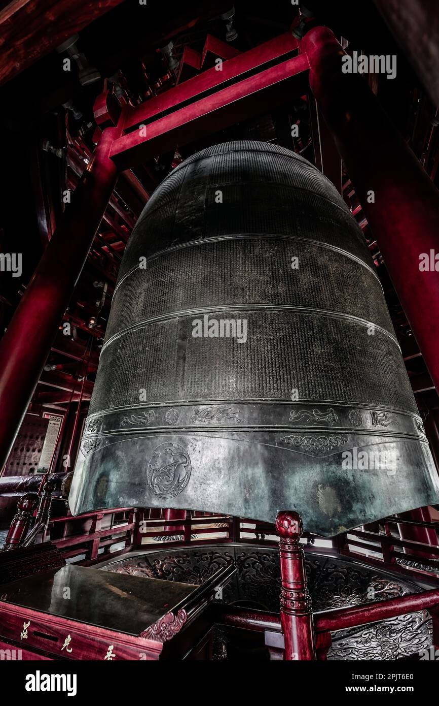 The giant bell in a famous temple in Zhejiang, China, is full of ...