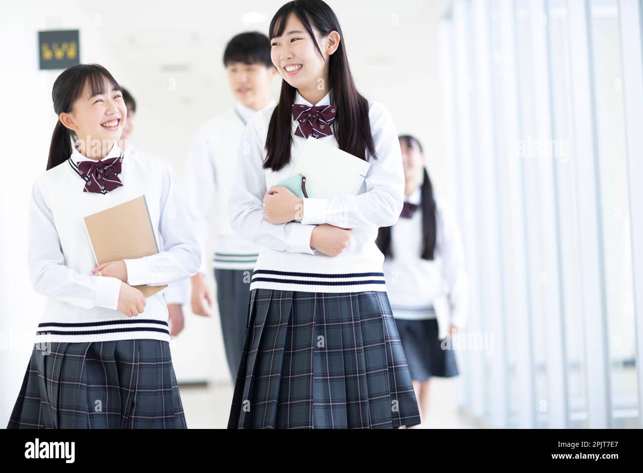 School boy walking out of school hi-res stock photography and images ...