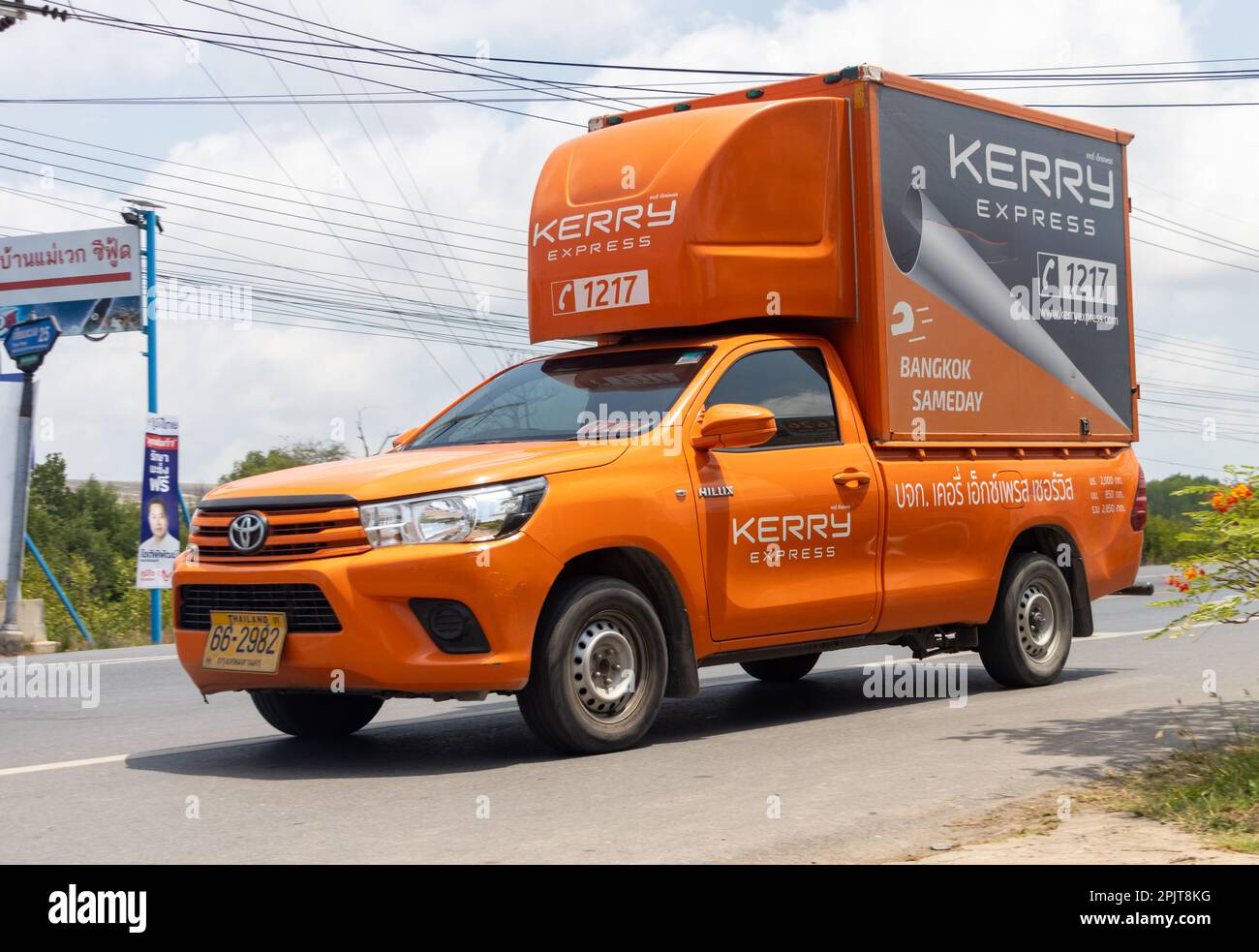 BANGKOK, THAILAND, MAR 24 2023, Pickup of delivery company Kerry Express ride on the road Stock ...
