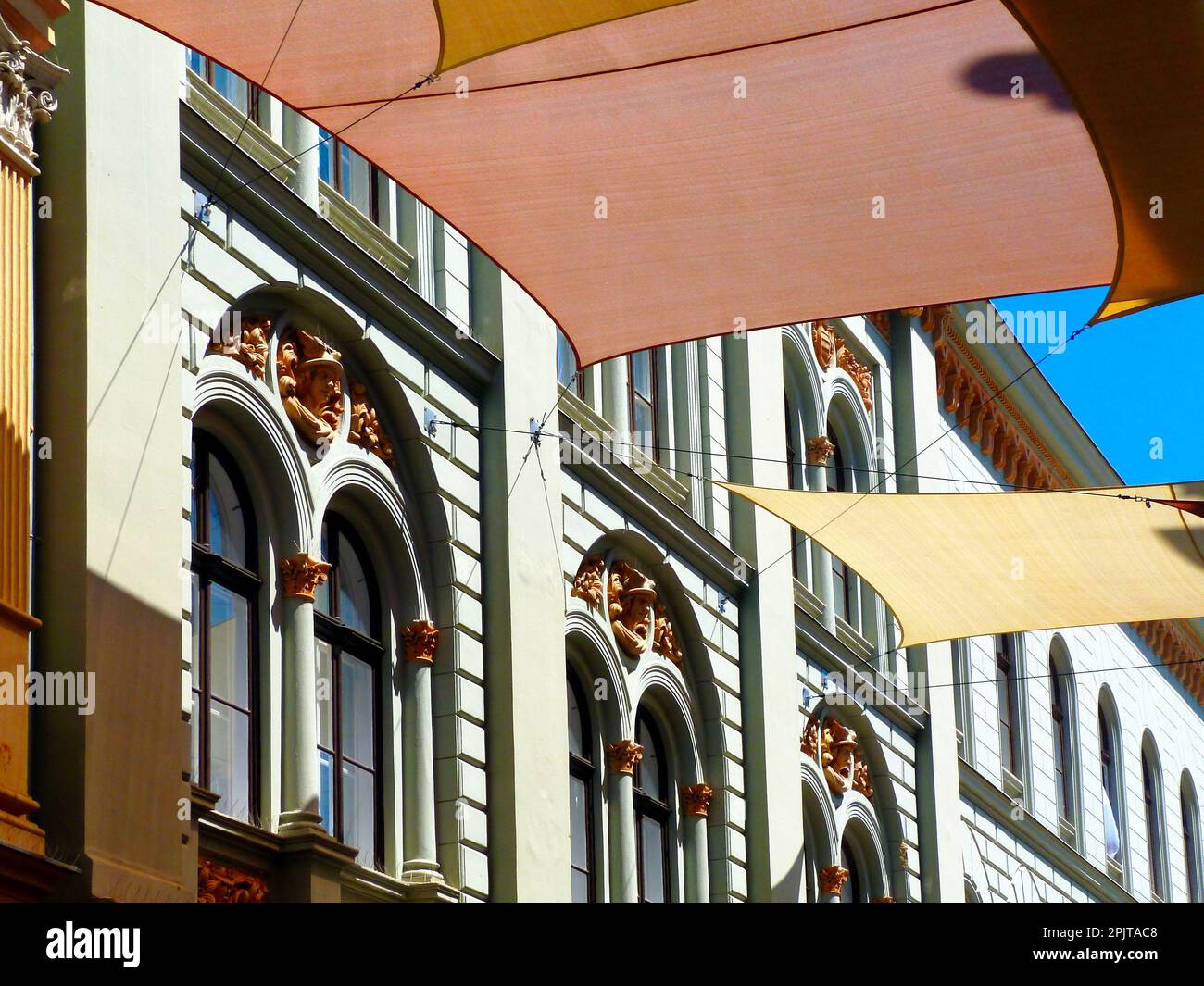 sun shade sail UV protection fabric. patio awning suspended from ...