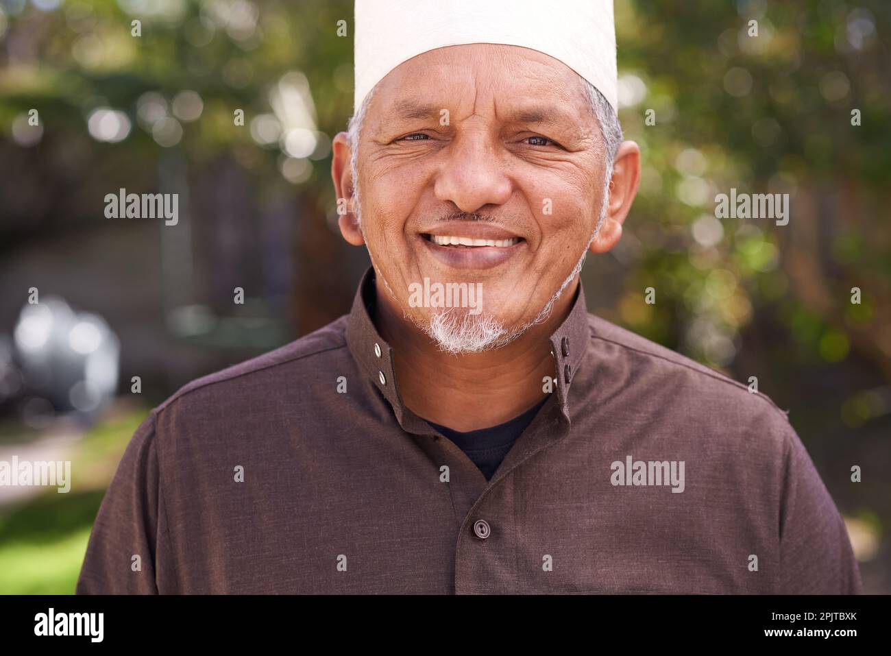 Proud of his heritage and culture. Portrait of a muslim man standing ...