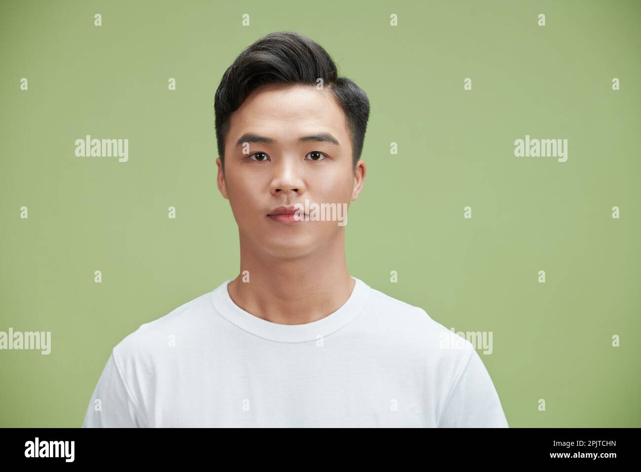 Portrait of a young handsome asian man Stock Photo - Alamy