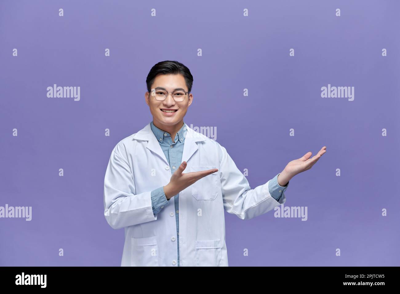 Doctor stethoscope holding something hi-res stock photography and ...