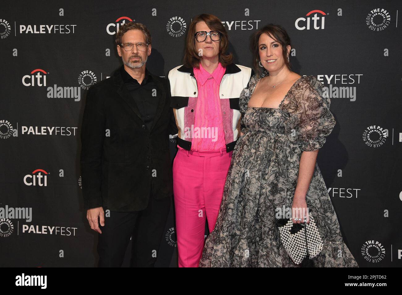 Jonathan Lisco, from left, Bart Nickerson and Ashley Lyle arrive at a ...