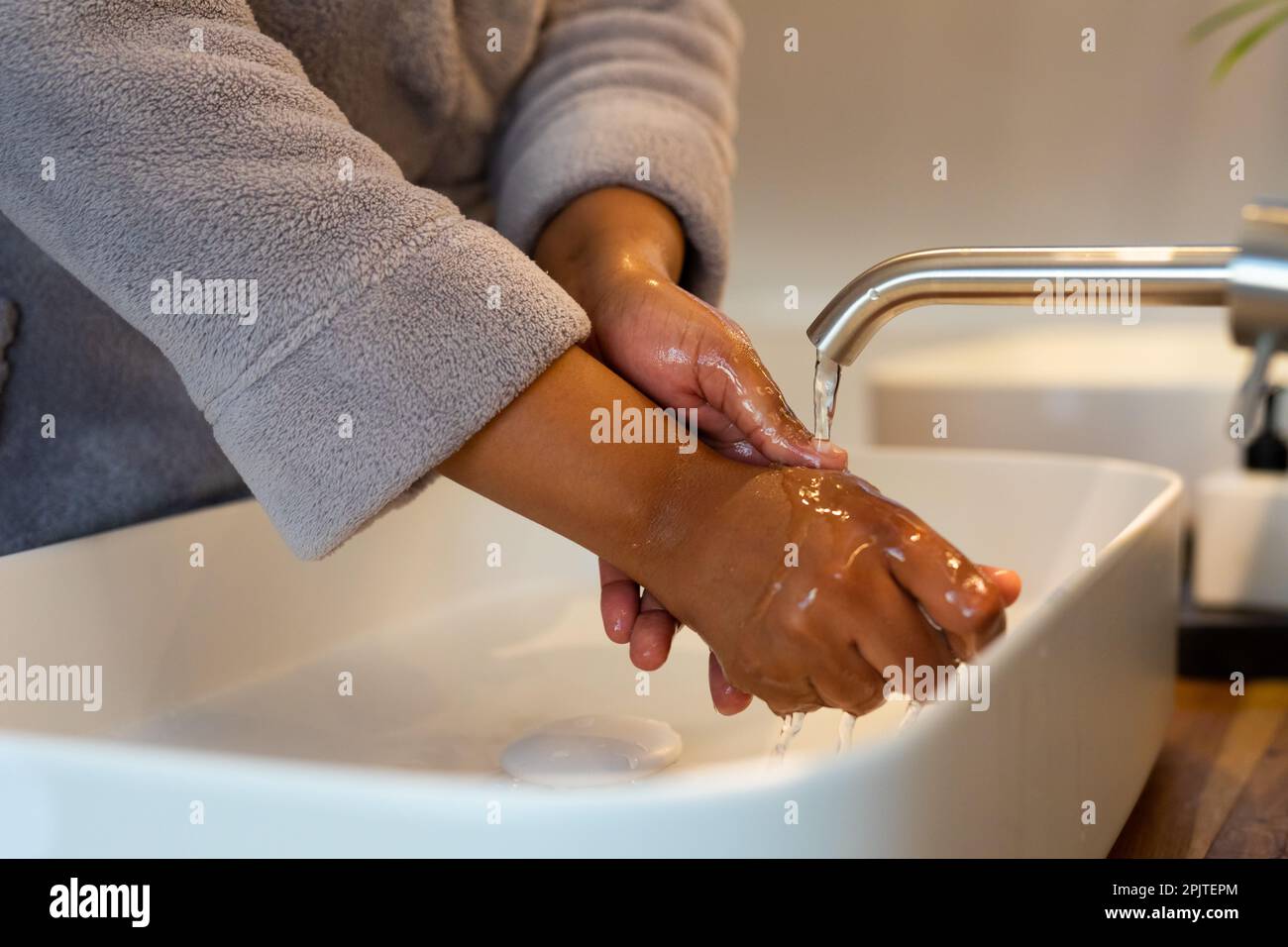 Midsection woman washing hands hi-res stock photography and images - Alamy