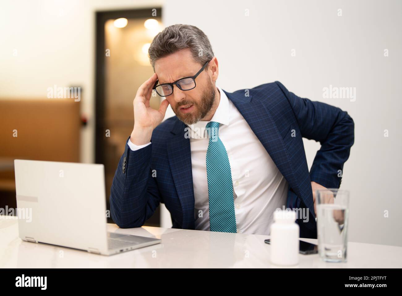 Tired, headache and eye strain on laptop. Man with stress, burnout and ...