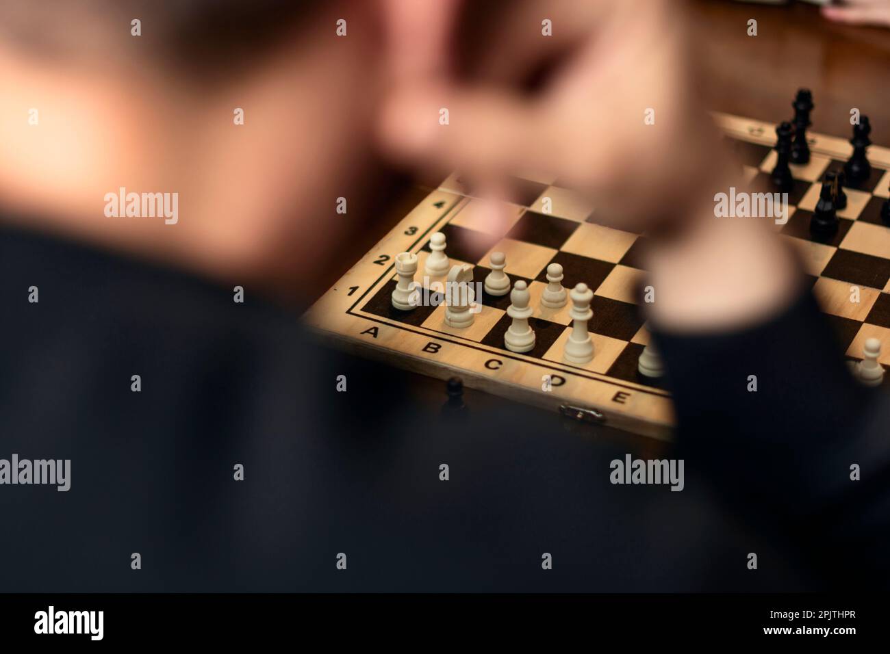 Playing chess and hand hi-res stock photography and images - Alamy