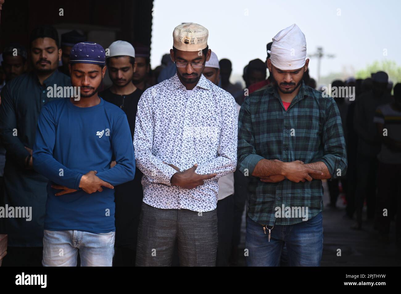 Muslim devotees offer Friday Prayers during the holy fasting month of ...