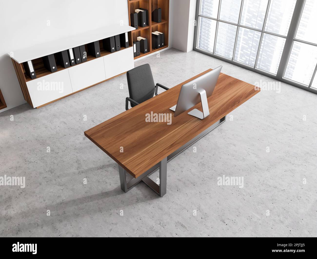 Top view of modern CEO office with white walls, concrete floor, wooden ...