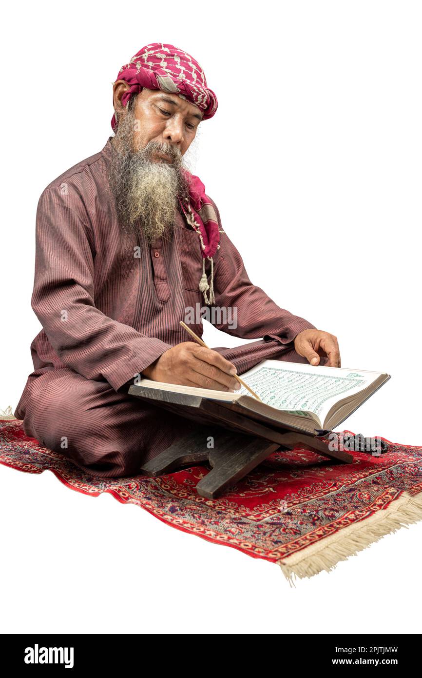 Old man reading quran Cut Out Stock Images & Pictures - Alamy