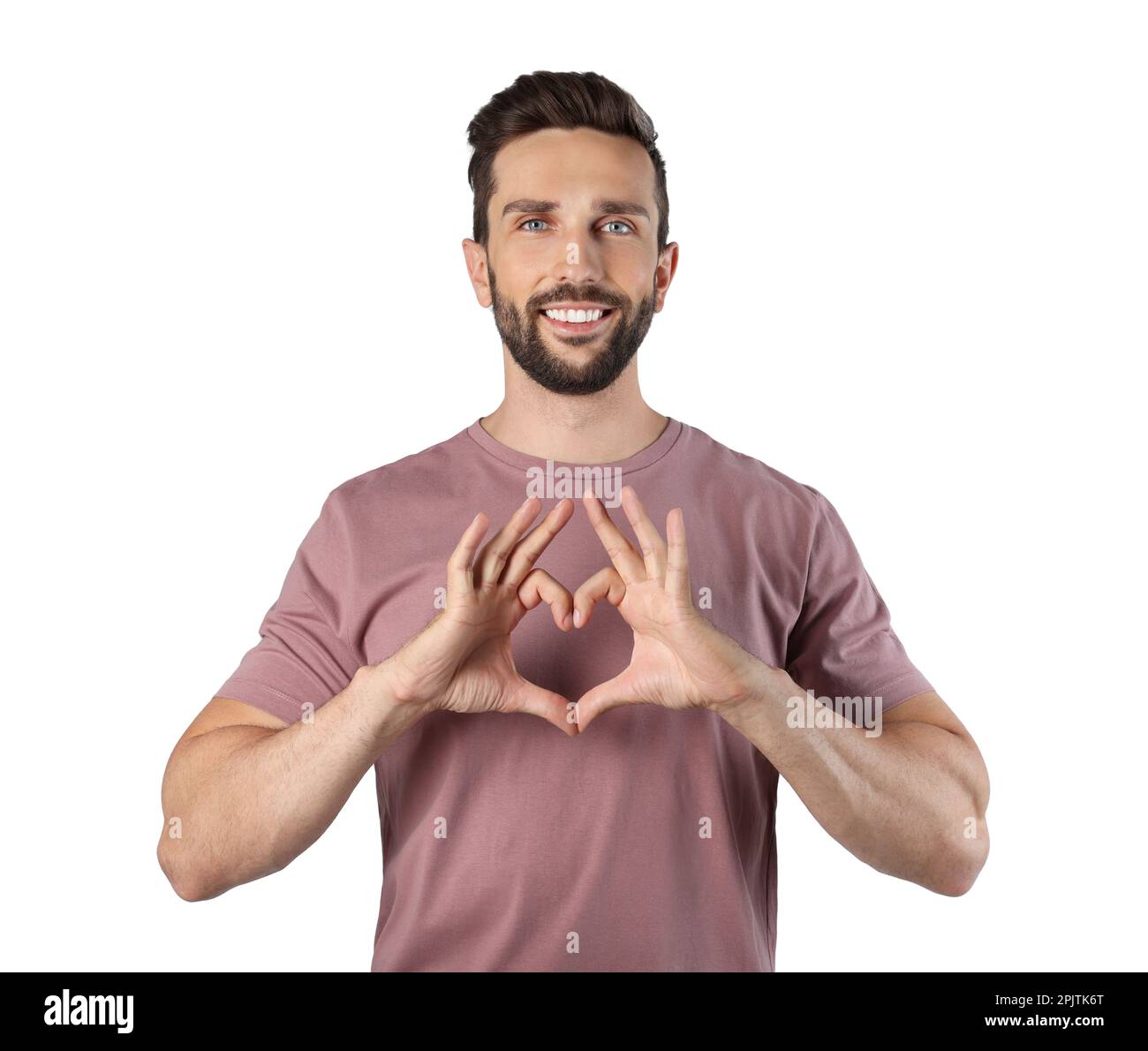 Happy man making heart with hands on white background Stock Photo - Alamy