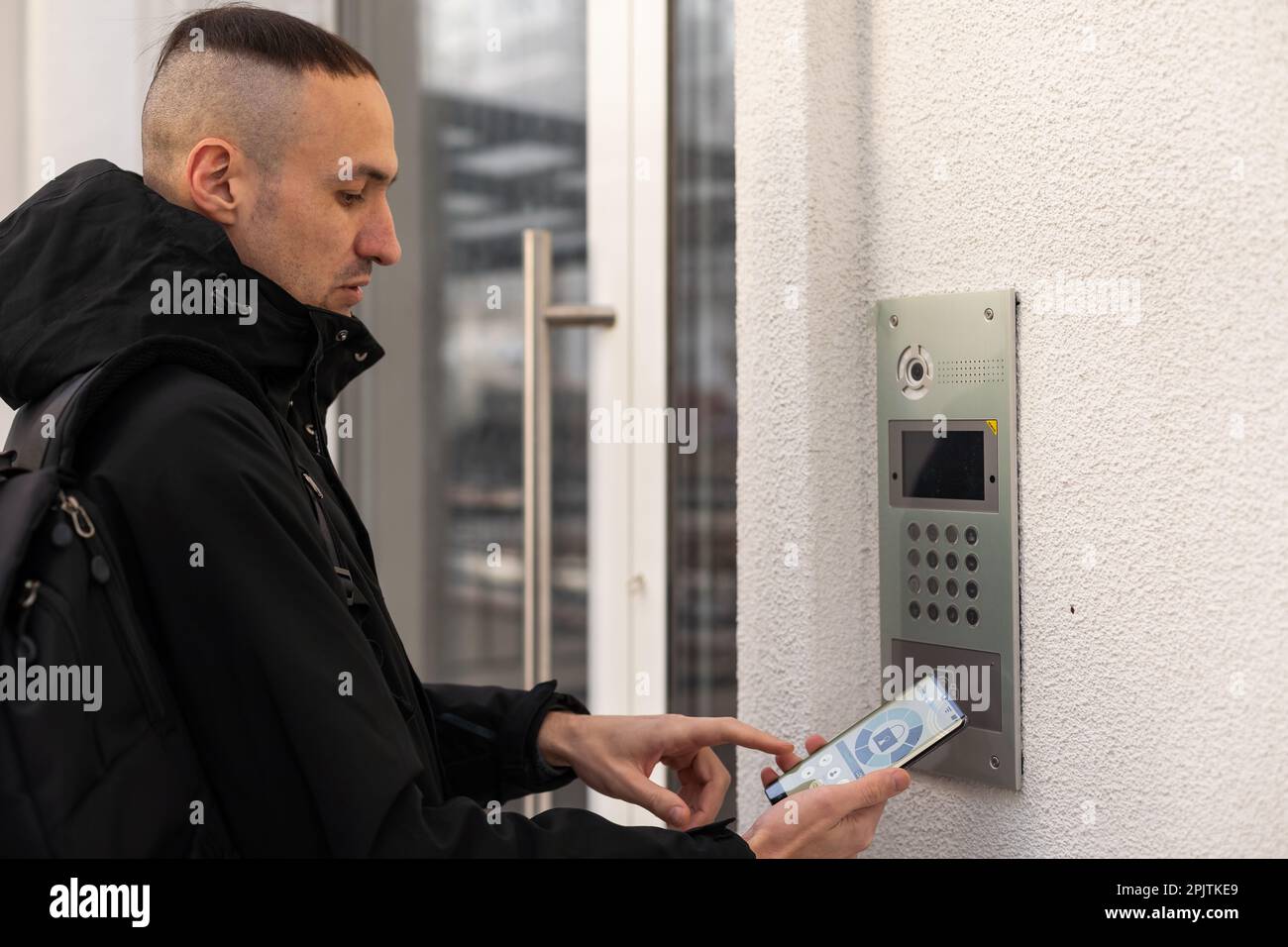 Turning on the intercom hi-res stock photography and images - Alamy