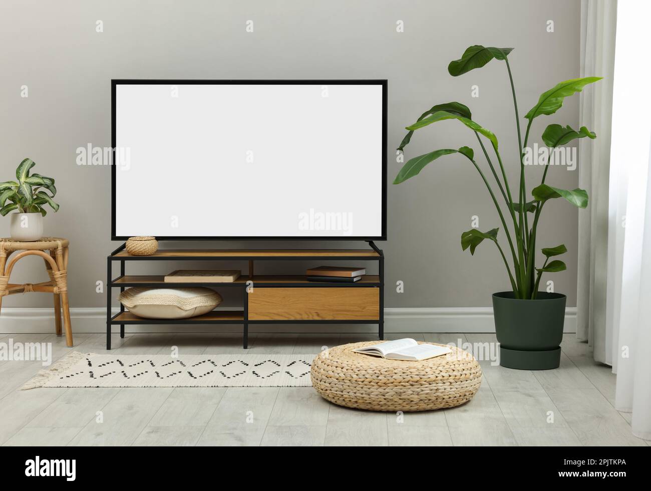 Modern TV set on stand in room Stock Photo - Alamy Modern TV set on stand in room Stock Photo - Alamy
