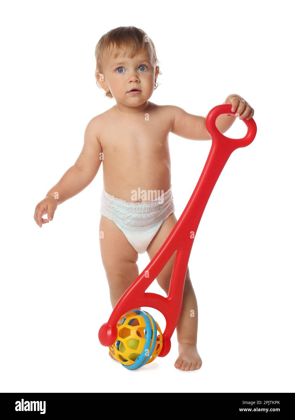 Cute baby with push toy learning to walk on white background Stock ...