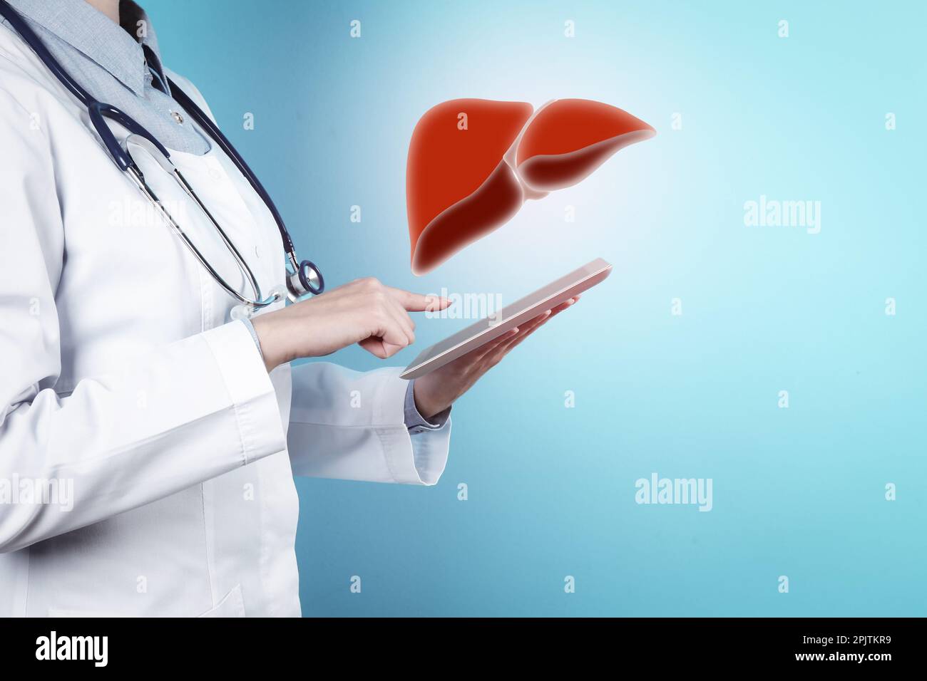 Doctor with tablet and illustration of healthy liver on light blue ...