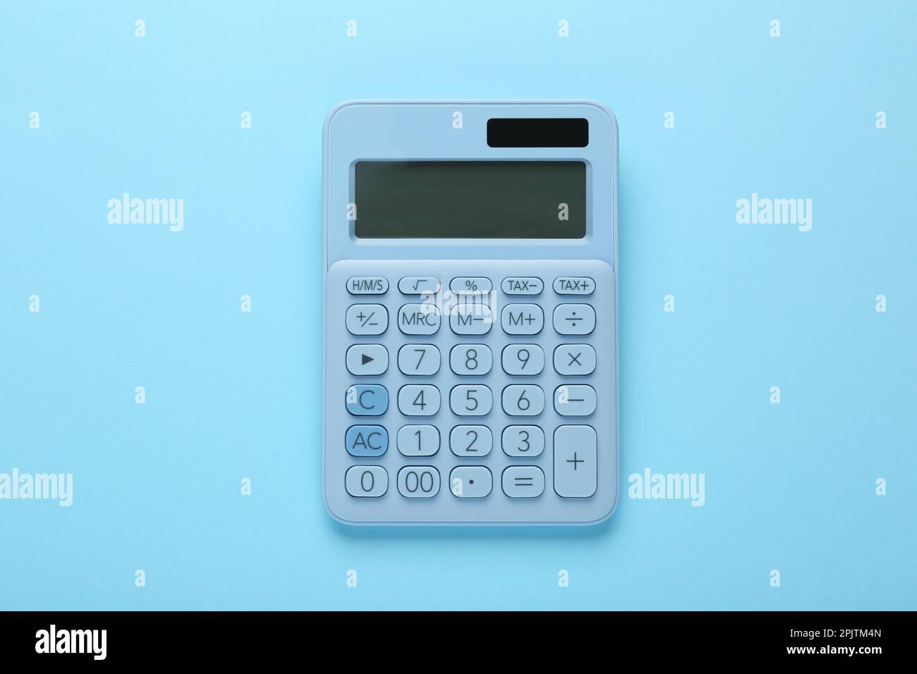 Modern calculator on light blue background, top view Stock Photo - Alamy