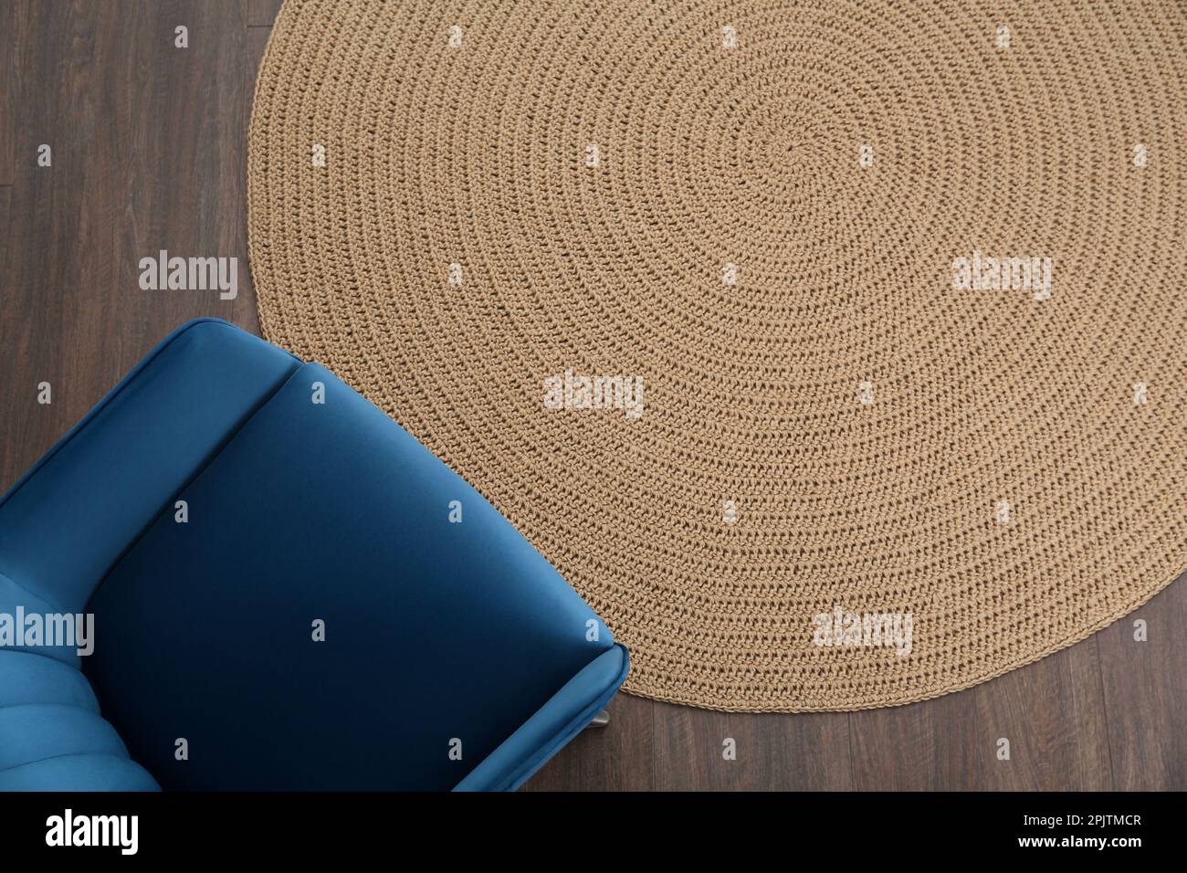 Stylish blue armchair on floor, top view. Space for text Stock Photo ...