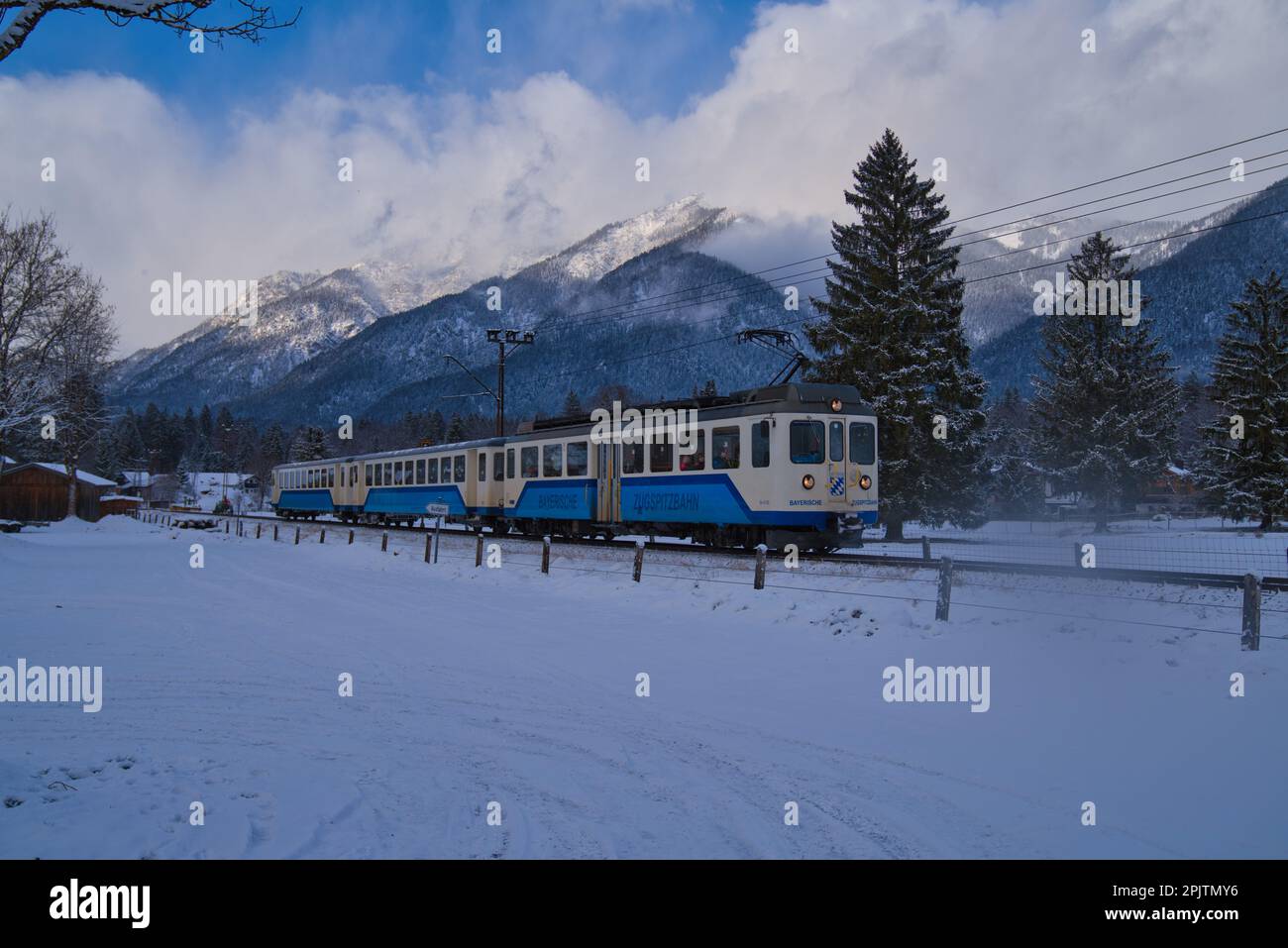Train through snowy mountain hi-res stock photography and images - Alamy