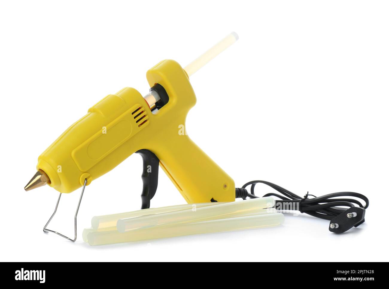 Yellow glue gun and sticks on white background Stock Photo - Alamy