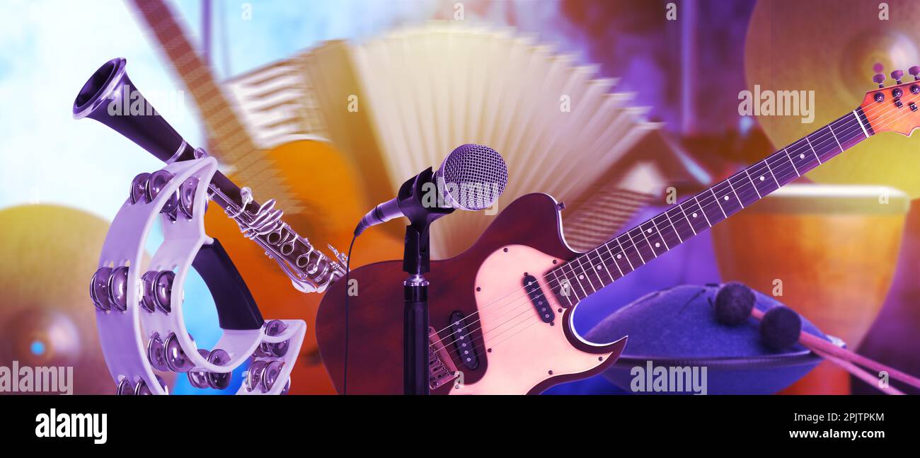 Creative banner design. Modern microphone and different musical ...