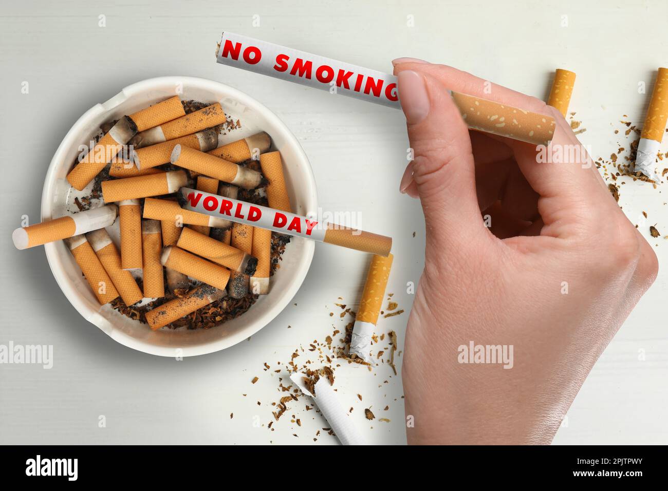 World No Smoking Day. Woman with cigarette near ashtray on white ...