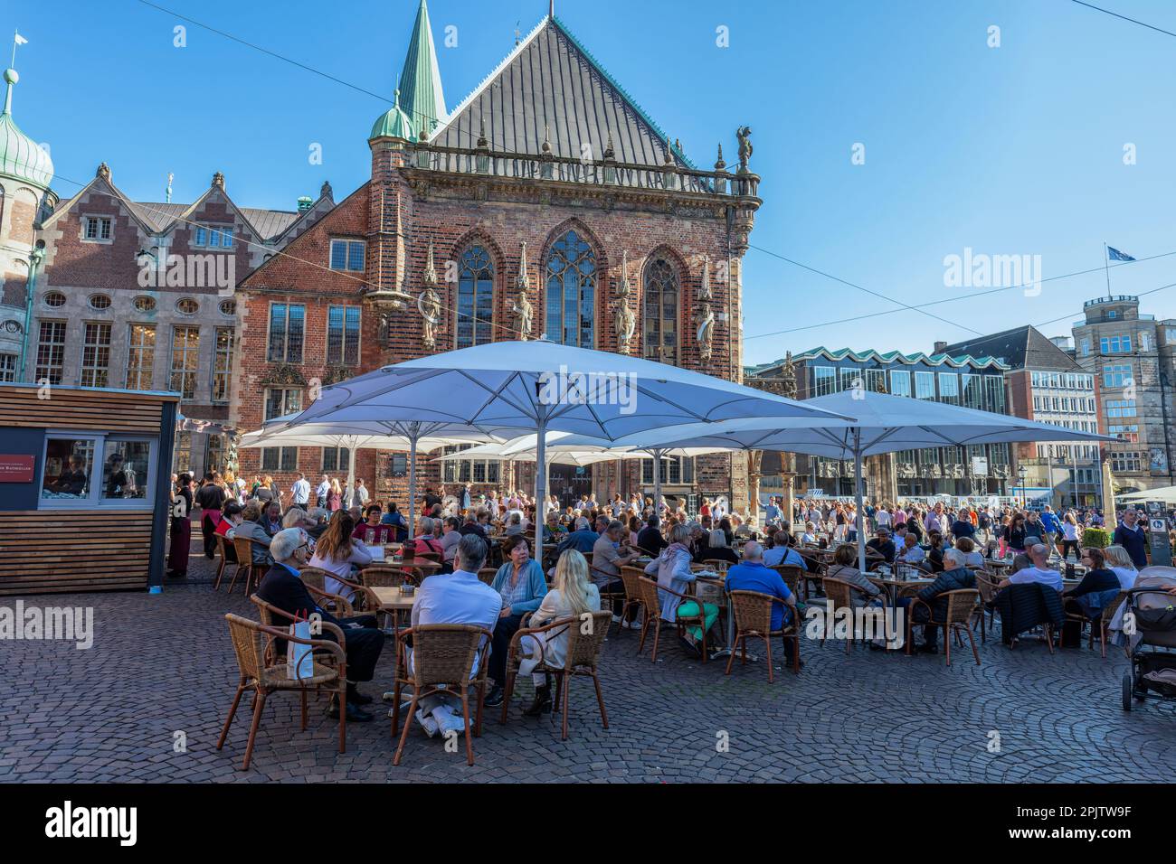 People in cafe, bar outside Ratskeller, traditional inn in cellar under ...