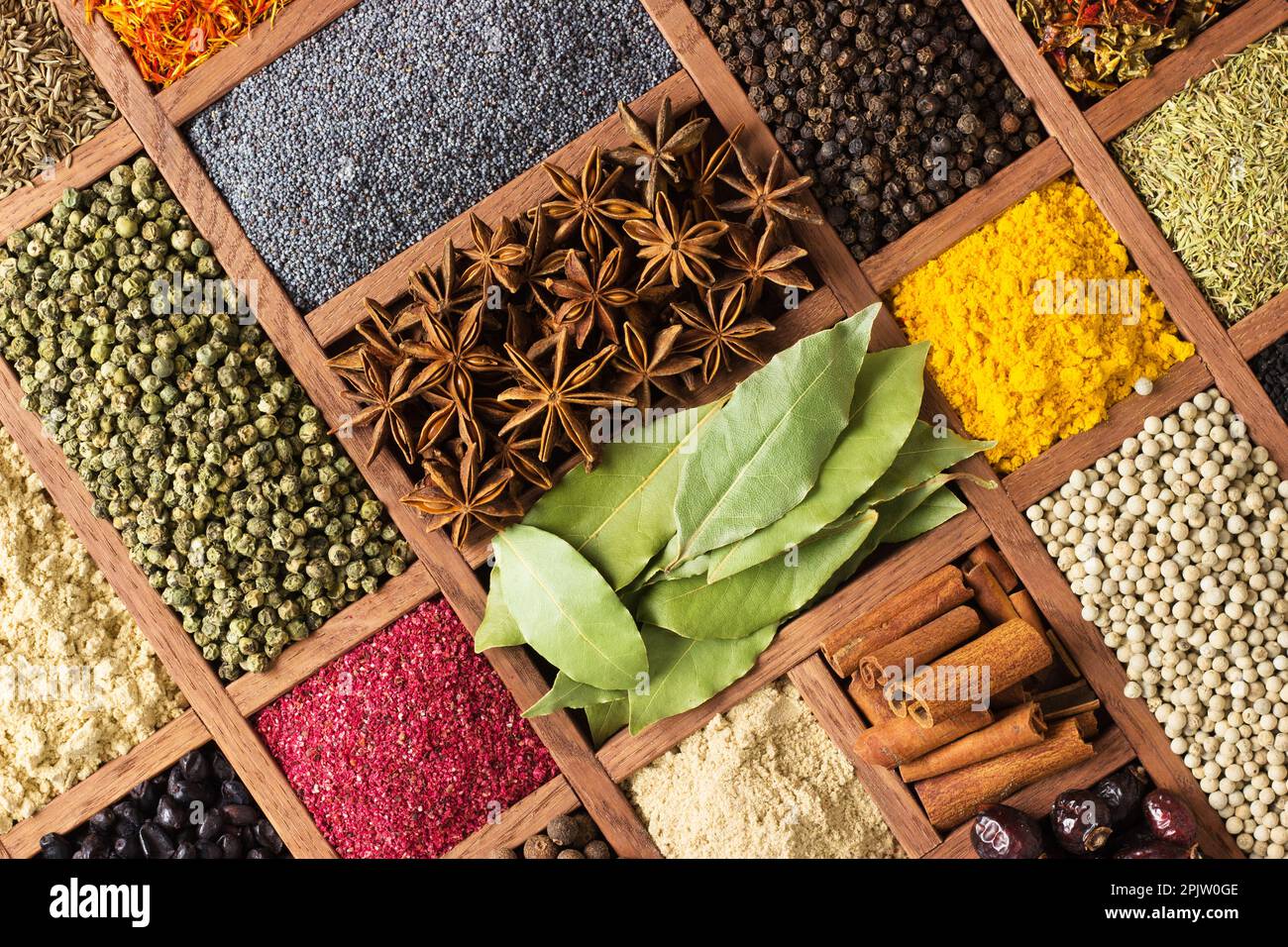 Spices and herbs for decorating food labels . Seasoning in wooden box ...